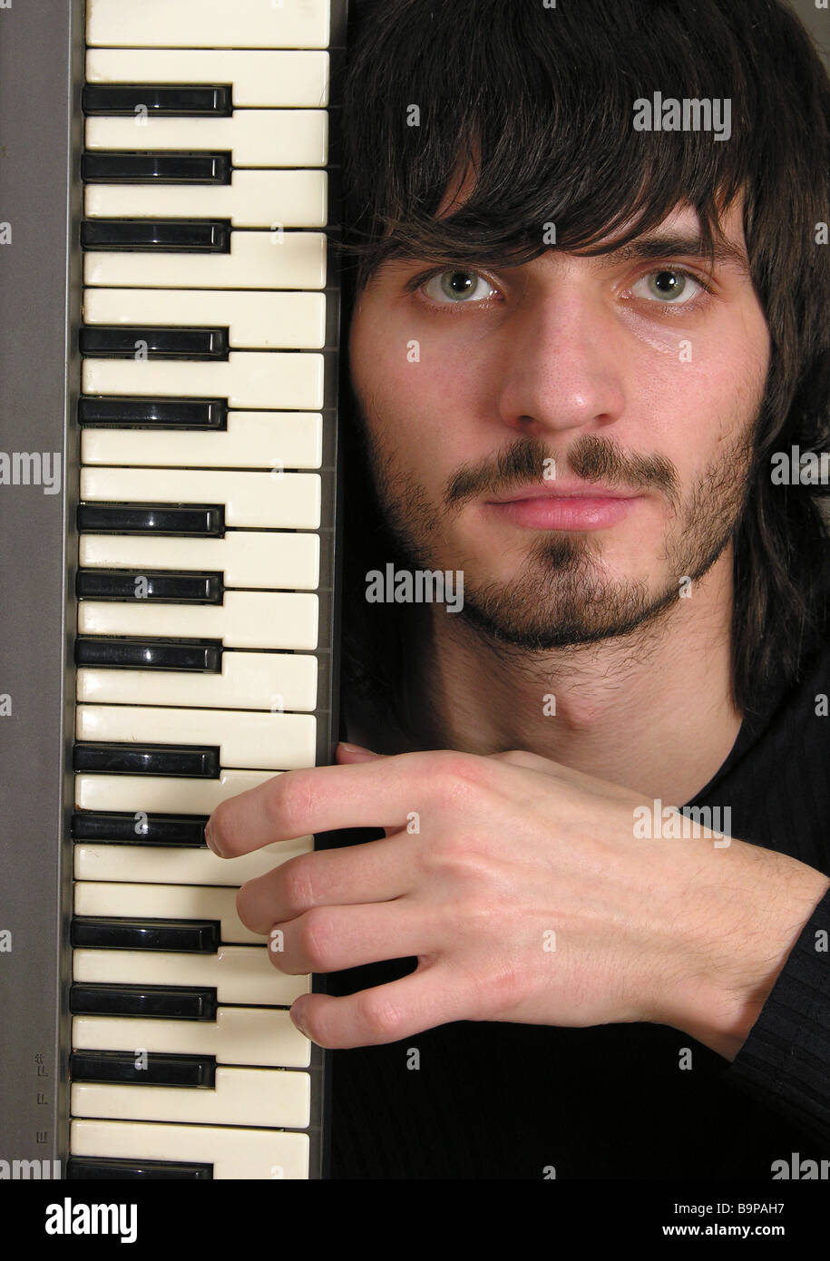 musician with keyboard Stock Photo - Alamy