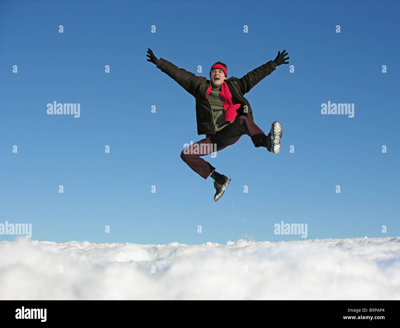 fly jump man. winter Stock Photo - Alamy