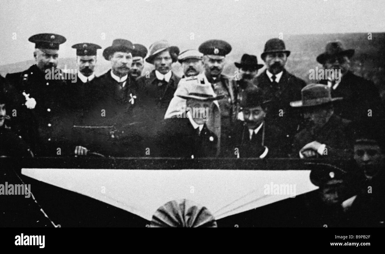 Polar explorer Fridtjof Nansen sitting center during his visit to ...