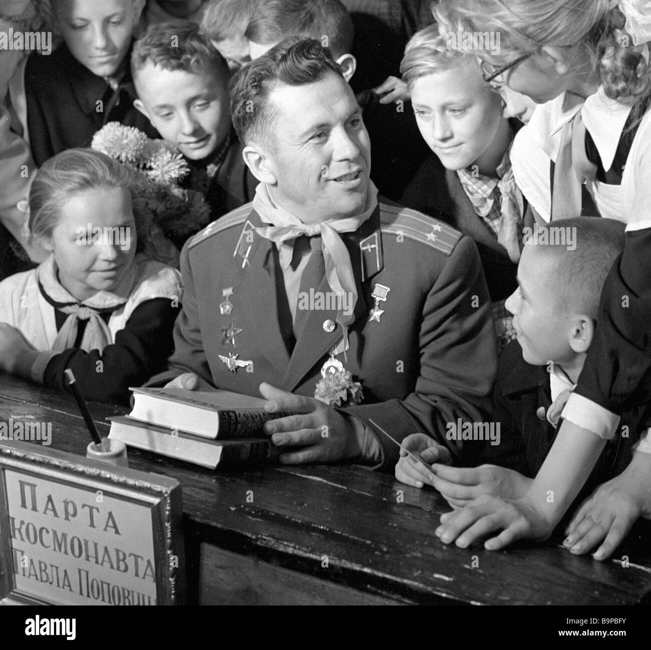 Cosmonaut Pavel Popovich talking to schoolchildren Stock Photo - Alamy