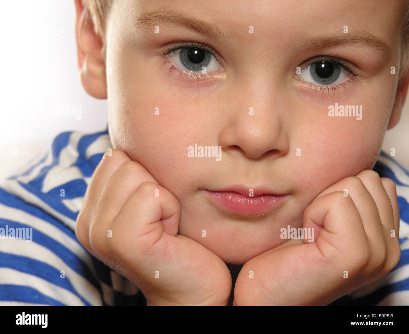 boy closeup with hands Stock Photo - Alamy