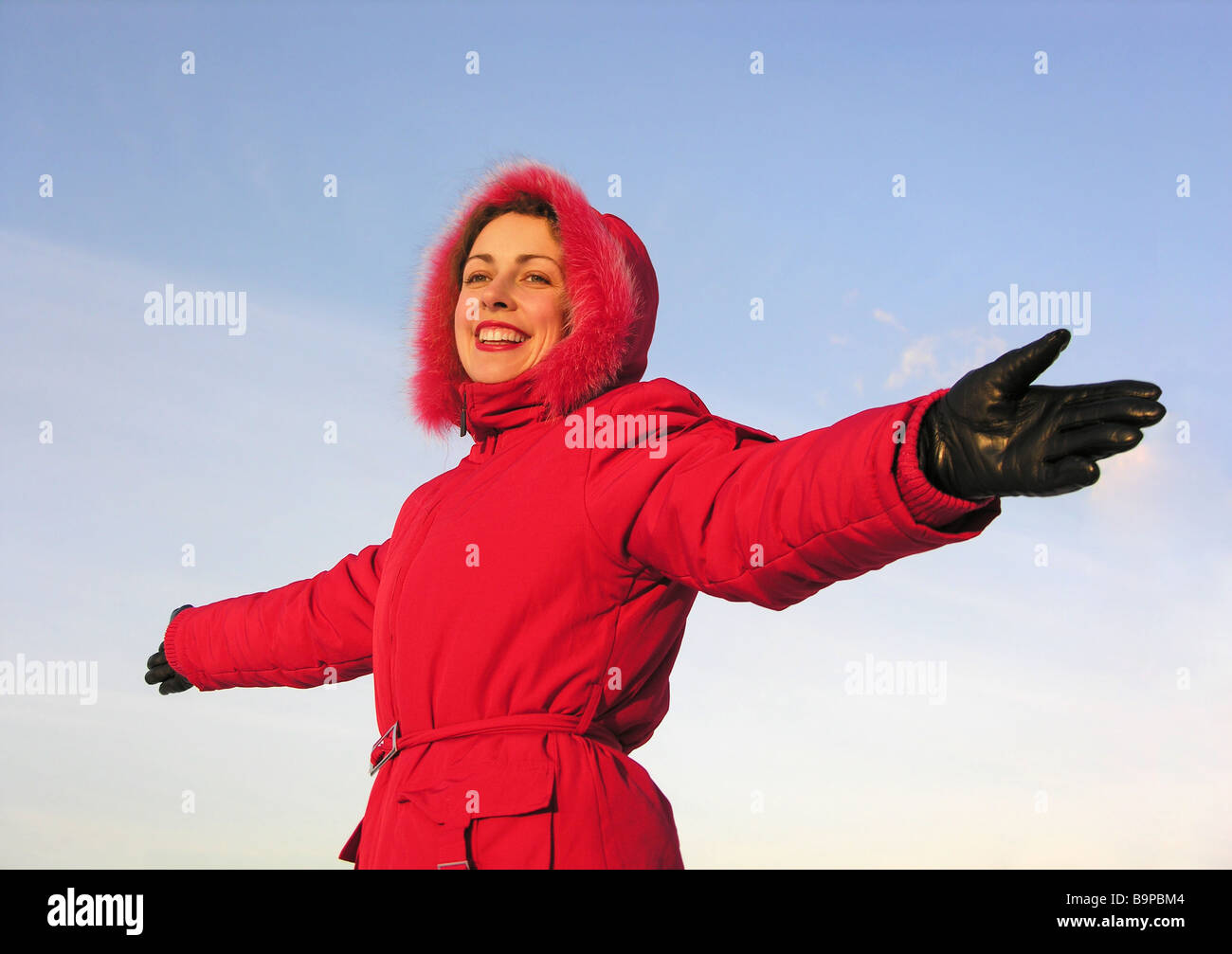 winter girl with fly hands Stock Photo - Alamy