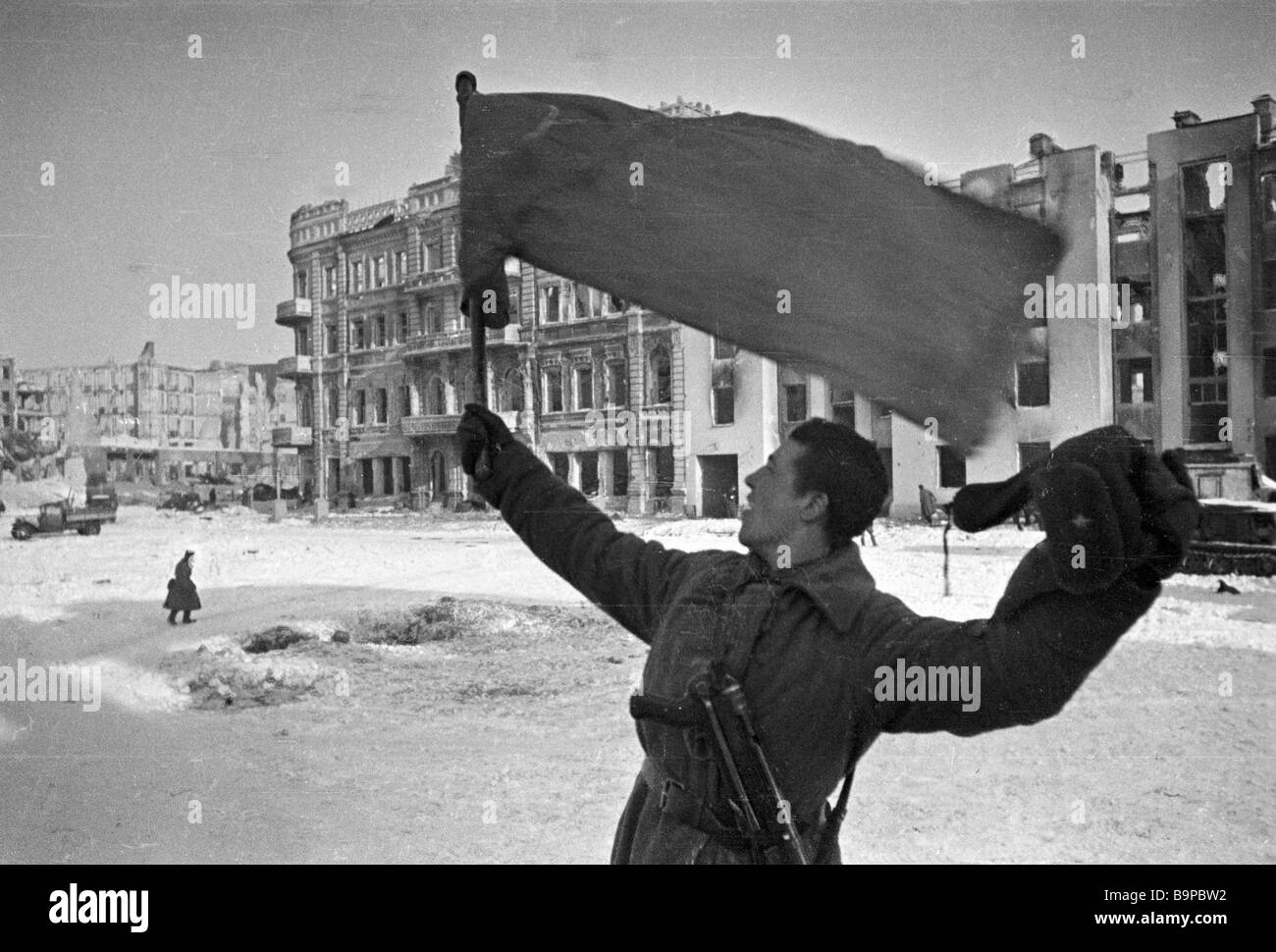 A soldier holding a flying flag in Stalingrad Stock Photo - Alamy