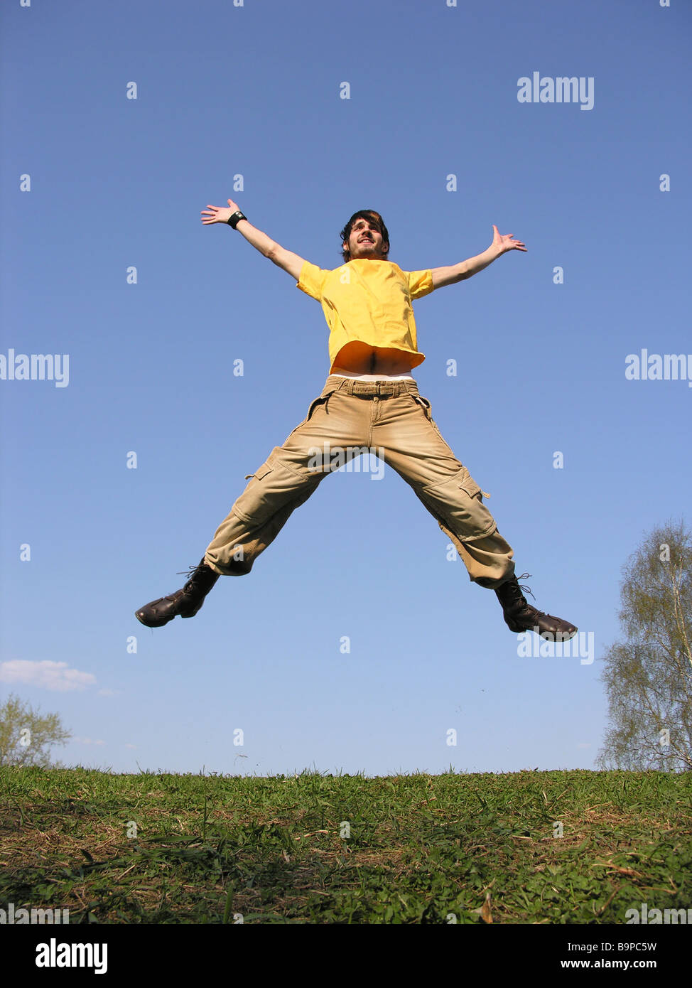 jump guy on meadow Stock Photo - Alamy