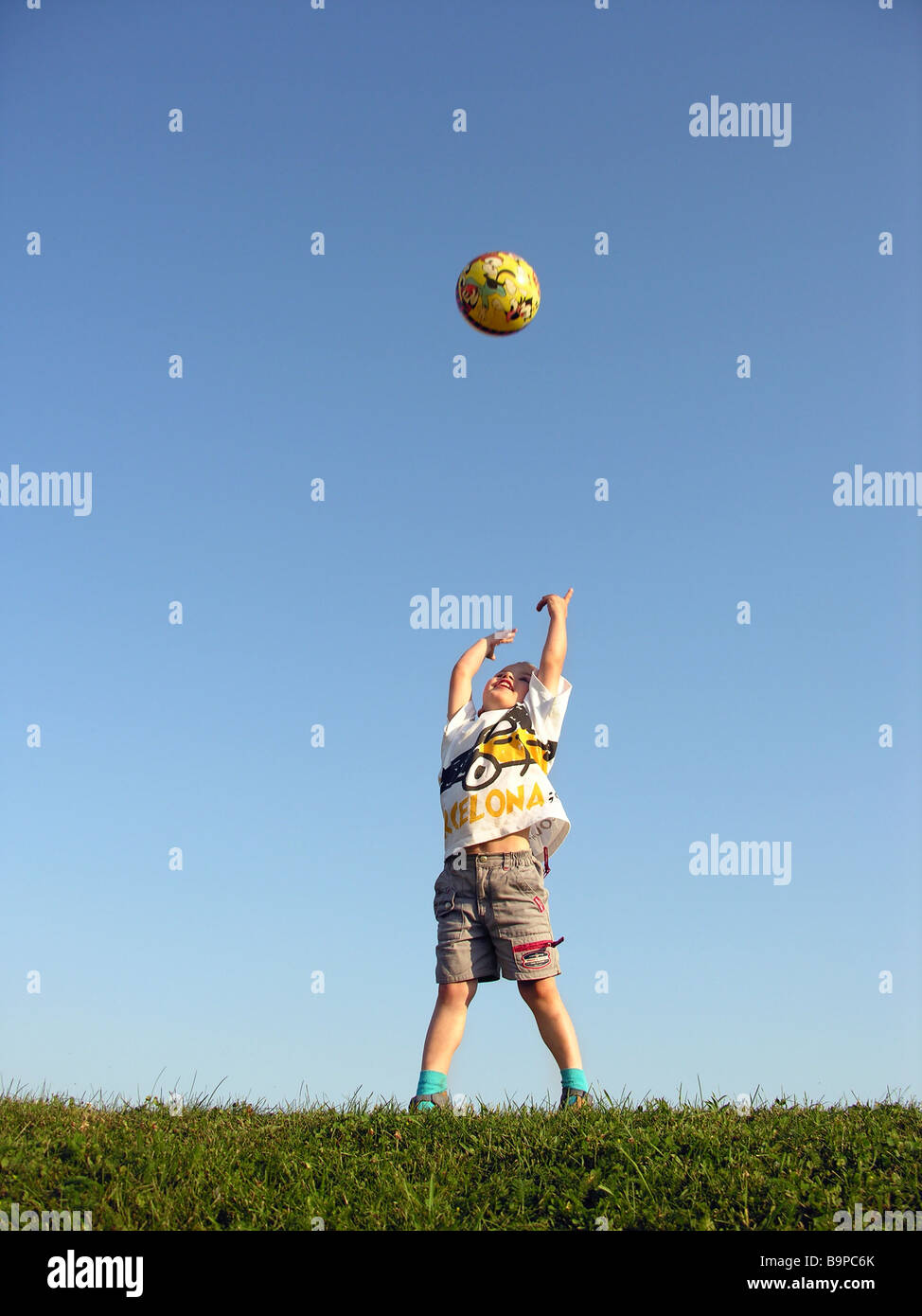 boy throw ball Stock Photo - Alamy