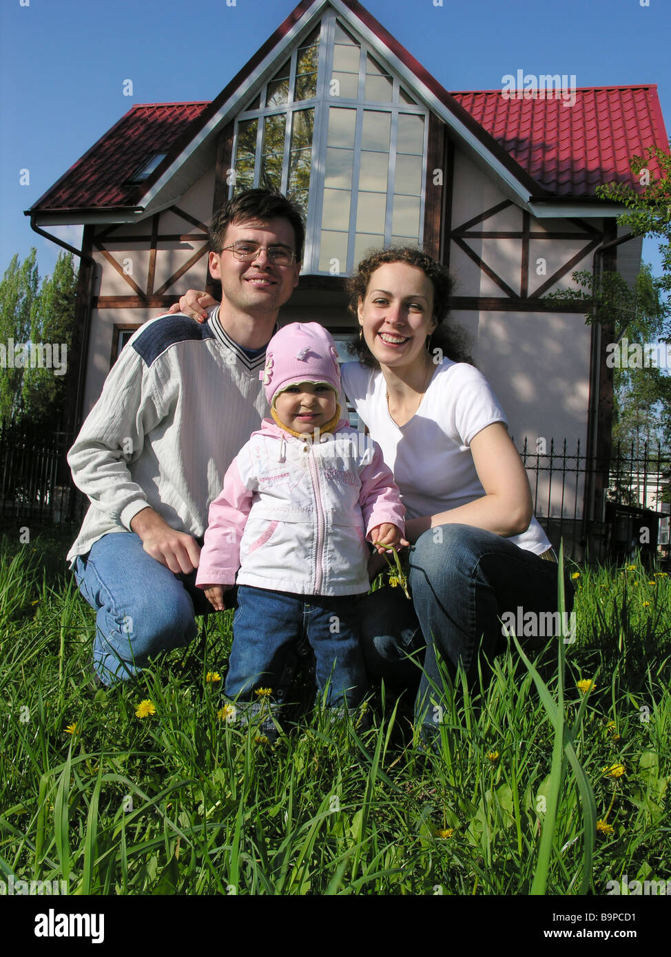 family and baby at home Stock Photo - Alamy
