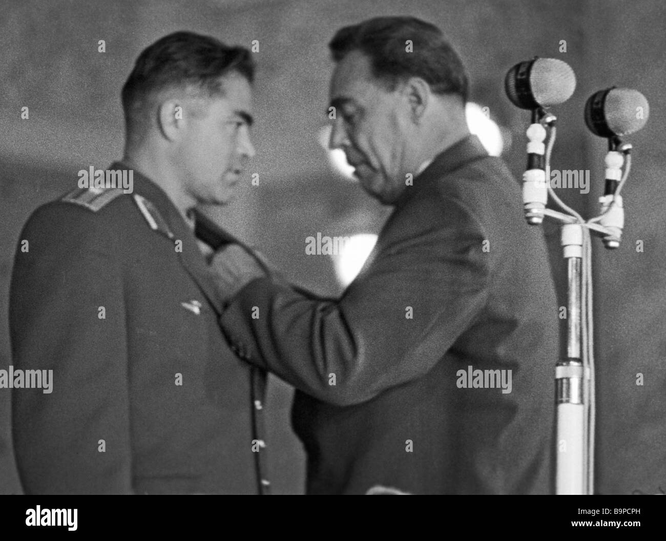 Chairman of the USSR Supreme Soviet presidium Leonid Brezhnev right ...