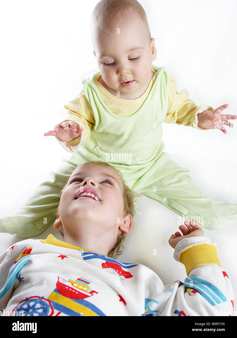 child with baby on white Stock Photo - Alamy