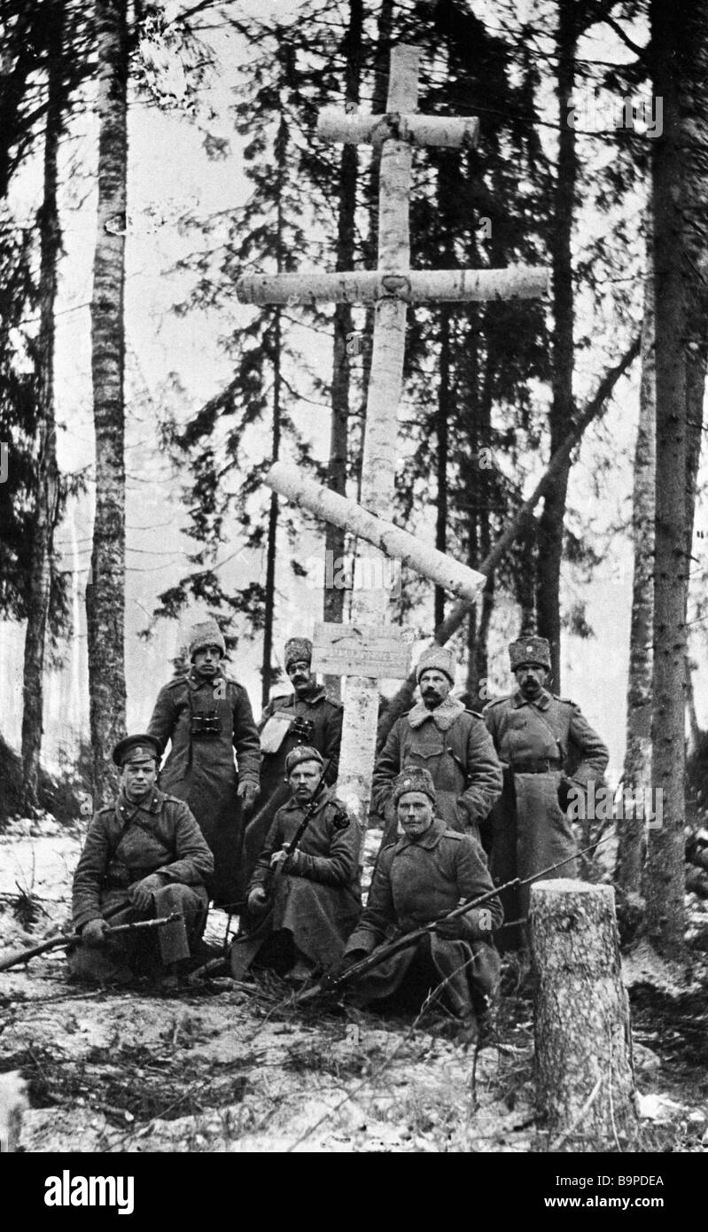 Soldiers of the 1st Russian Army standing near the cross over the ...