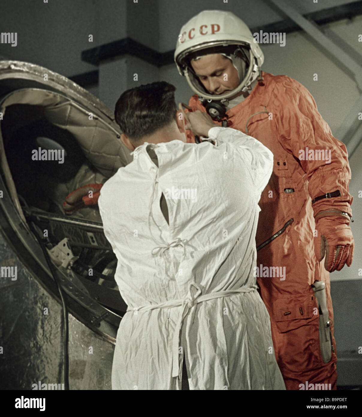 Cosmonaut Pavel Popovich trying on a spacesuit Stock Photo - Alamy
