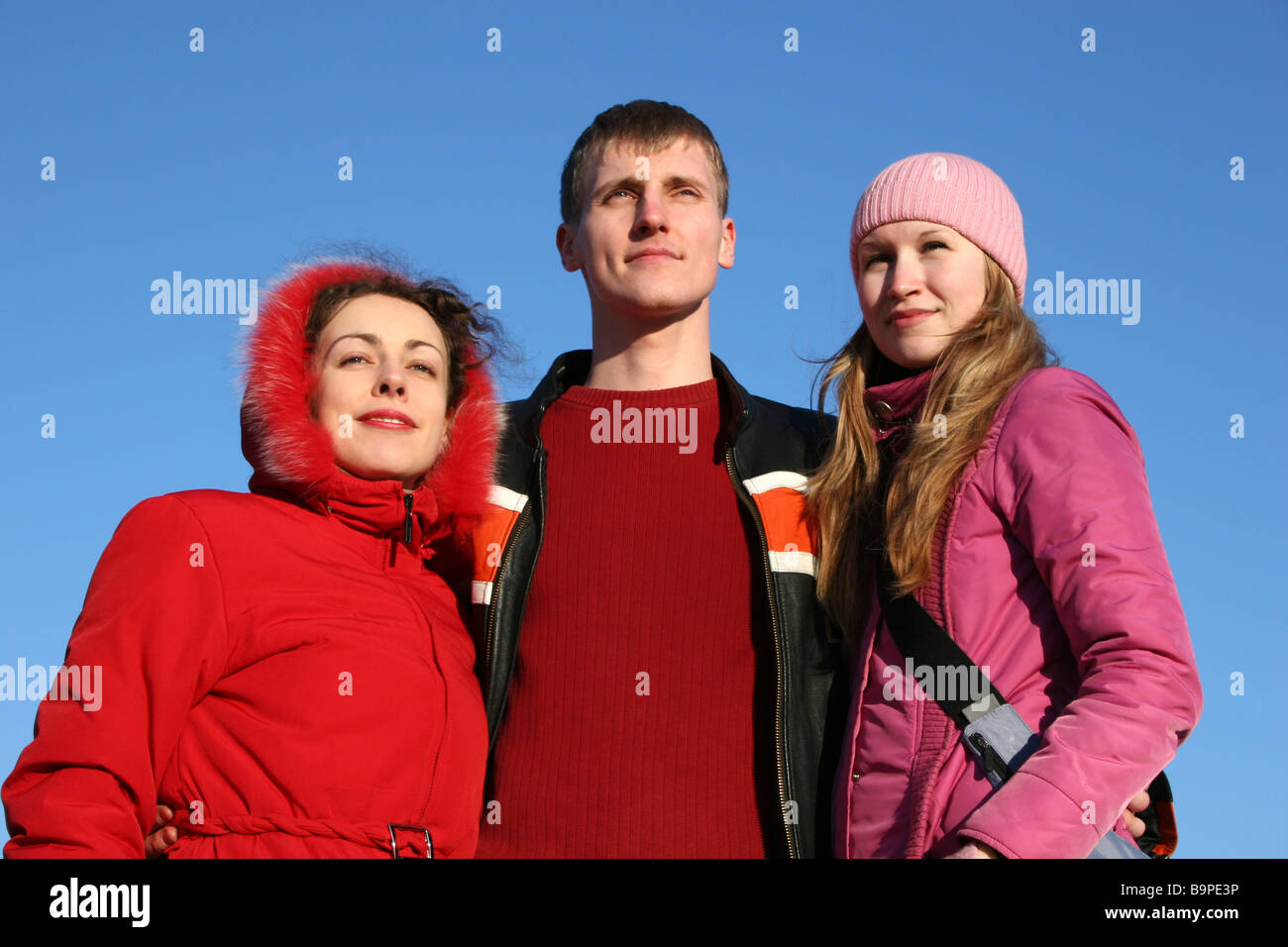 three friends. front Stock Photo - Alamy
