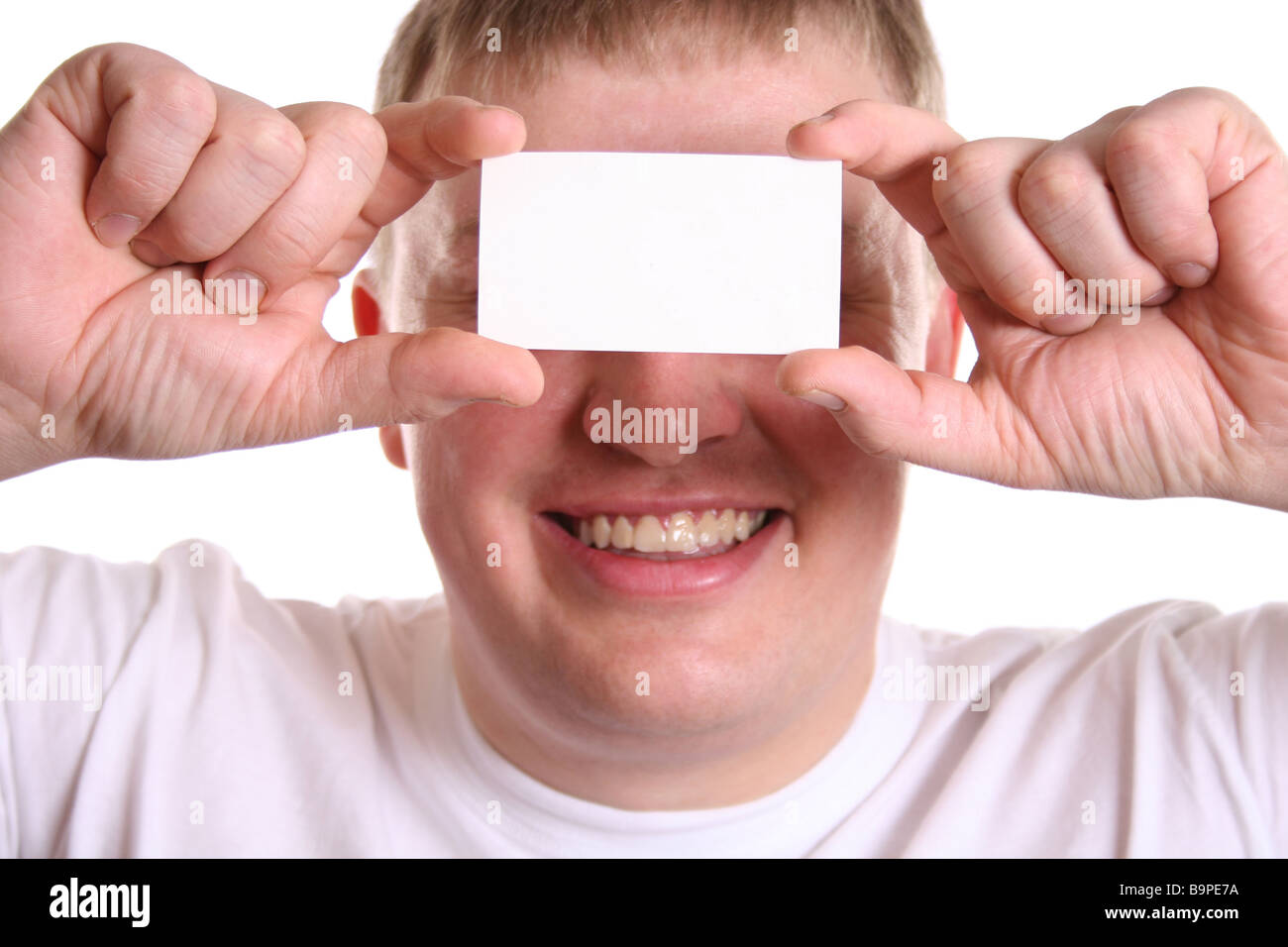 man with card for text on eyes Stock Photo - Alamy
