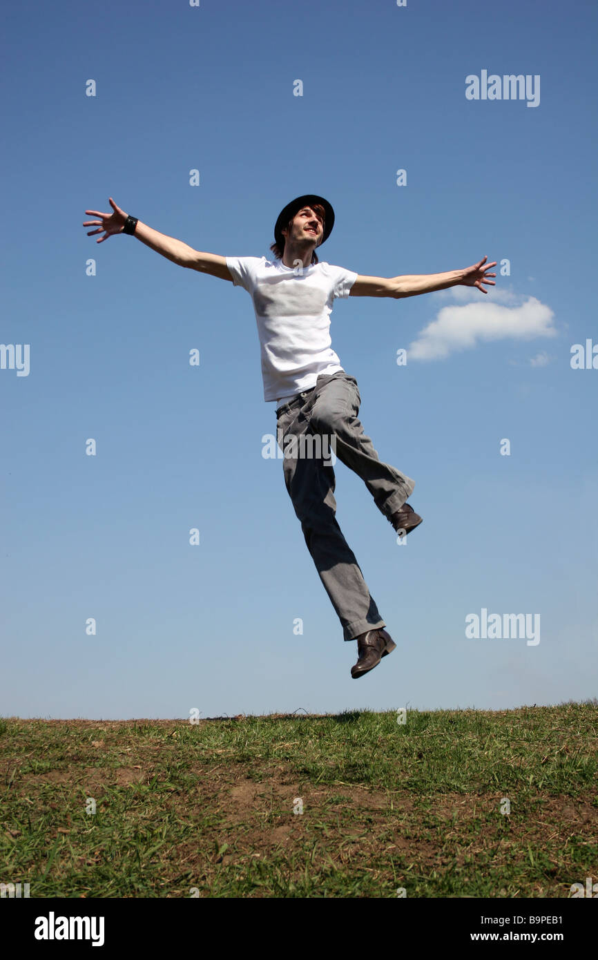 jump boy on meadoww Stock Photo - Alamy
