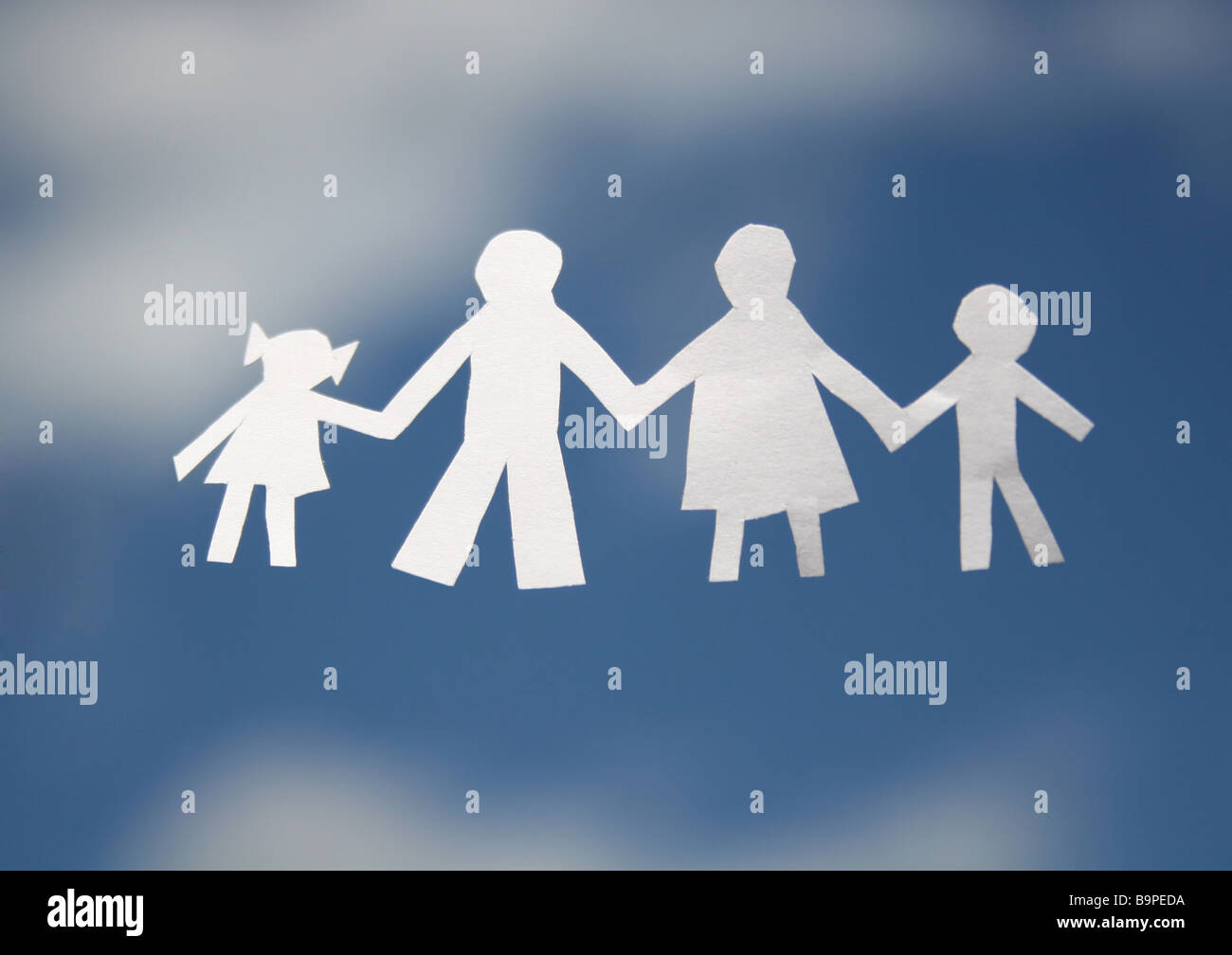 paper family on sky Stock Photo - Alamy