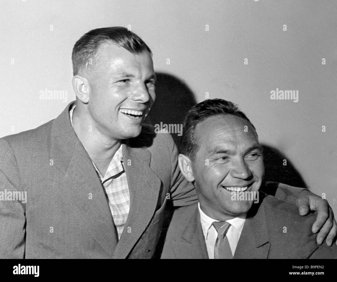 Space pilot Hero of the Soviet Union Yuri Gagarin left and test pilot ...