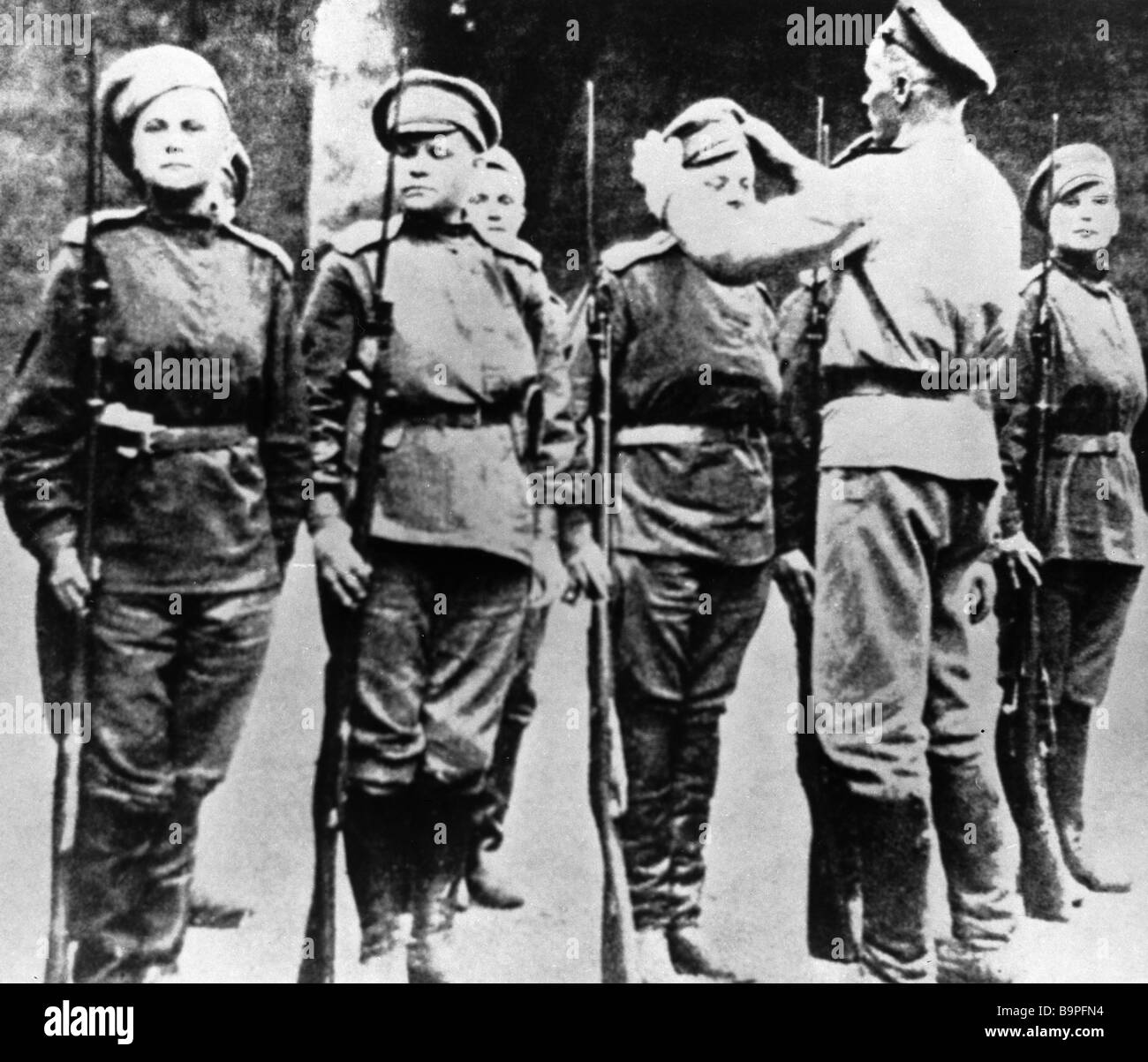 A noncom checking women s Death Squad uniforms in Petrograd 1917 Stock ...
