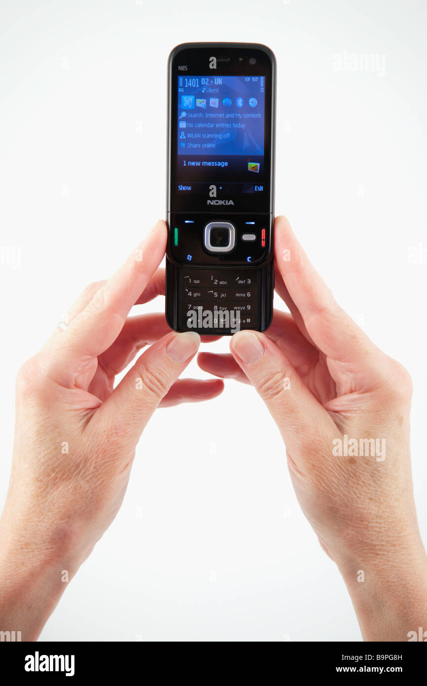 Hands & Nokia Mobile Phone Communications Page Stock Photo - Alamy
