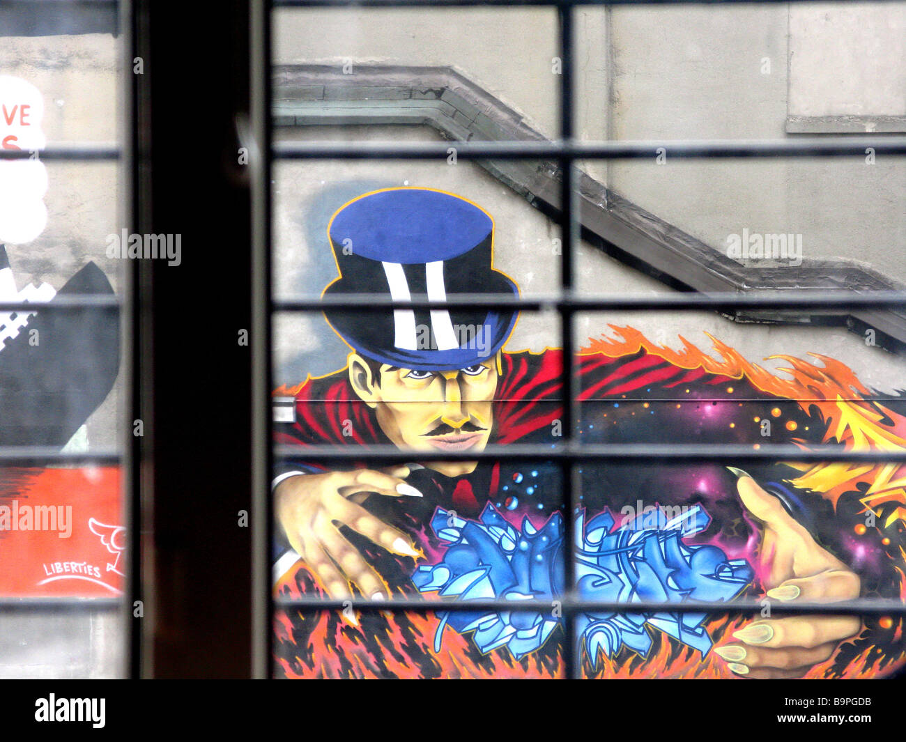 Large piece of Graffitti on a wall as seen through a window Stock Photo ...