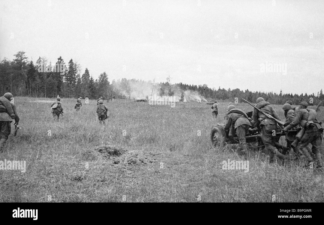 Soviet infantry and artillery men going to a new firing position Stock ...