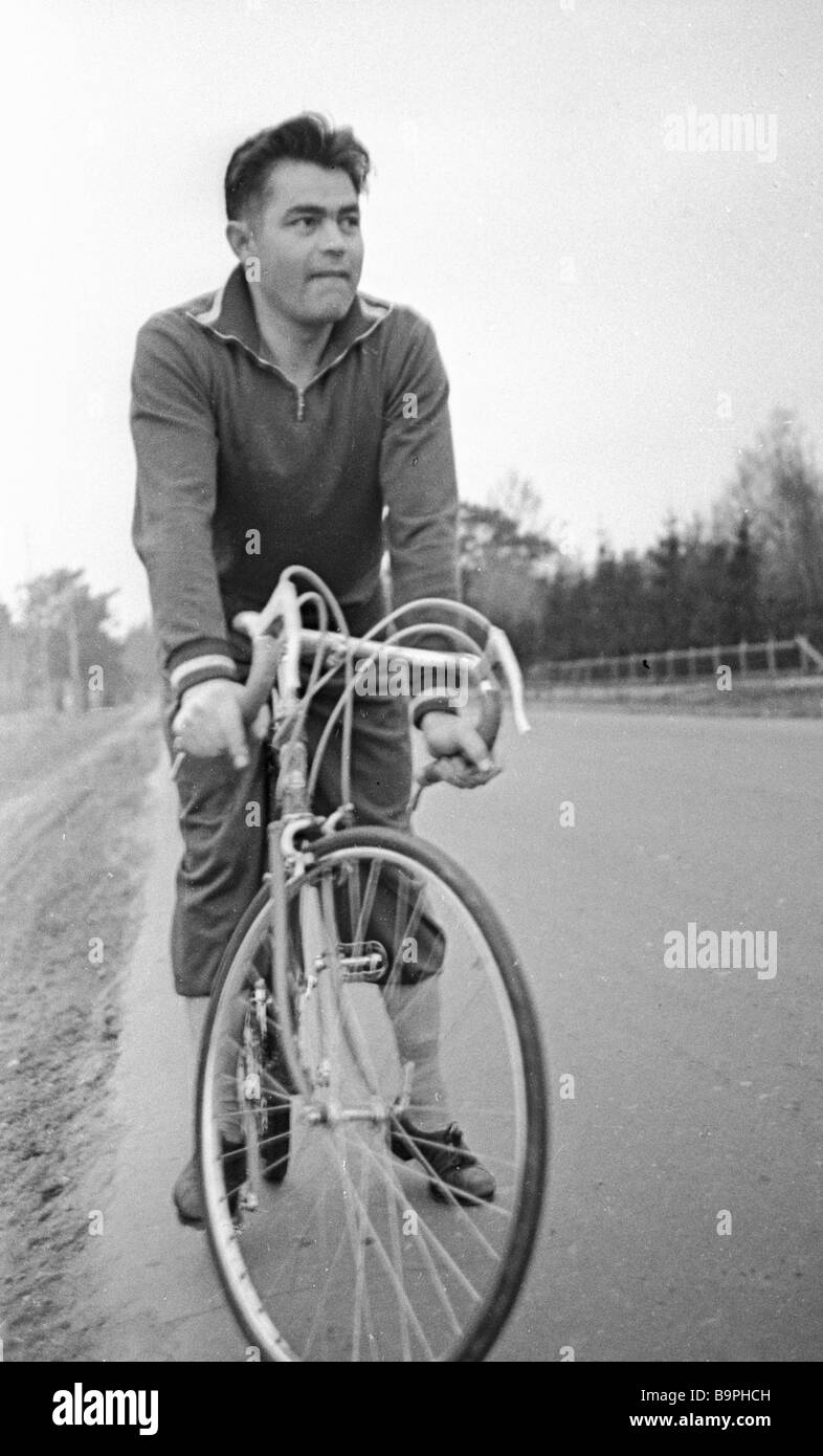 Pilot cosmonaut Andriyan Nikolayev riding a bike Stock Photo - Alamy