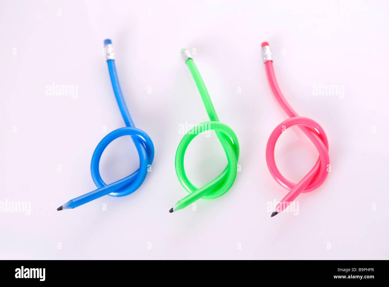 Three flexible pencils on a white background Stock Photo - Alamy