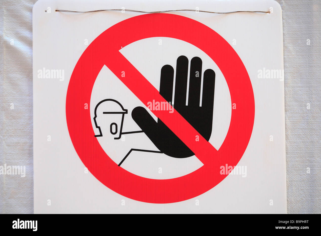 Sign showing hand Stock Photo - Alamy