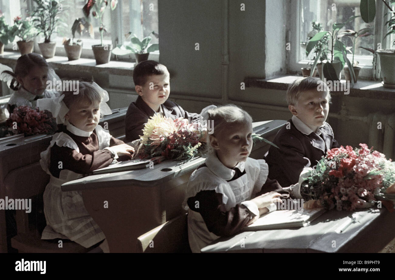 First grade school students attend their first lesson Stock Photo - Alamy