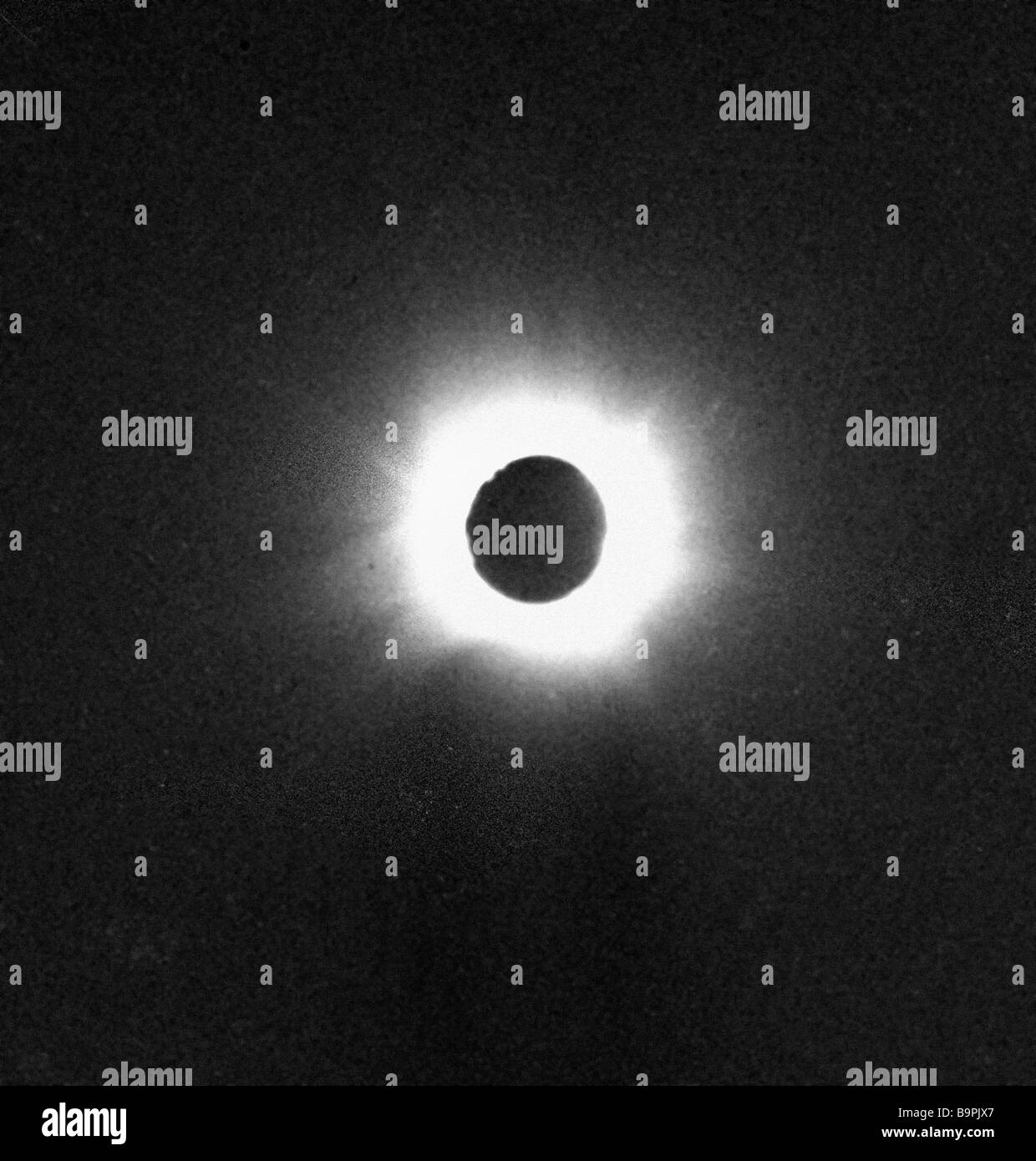 The lunar disk fully hides the Sun during an eclipse Stock Photo - Alamy