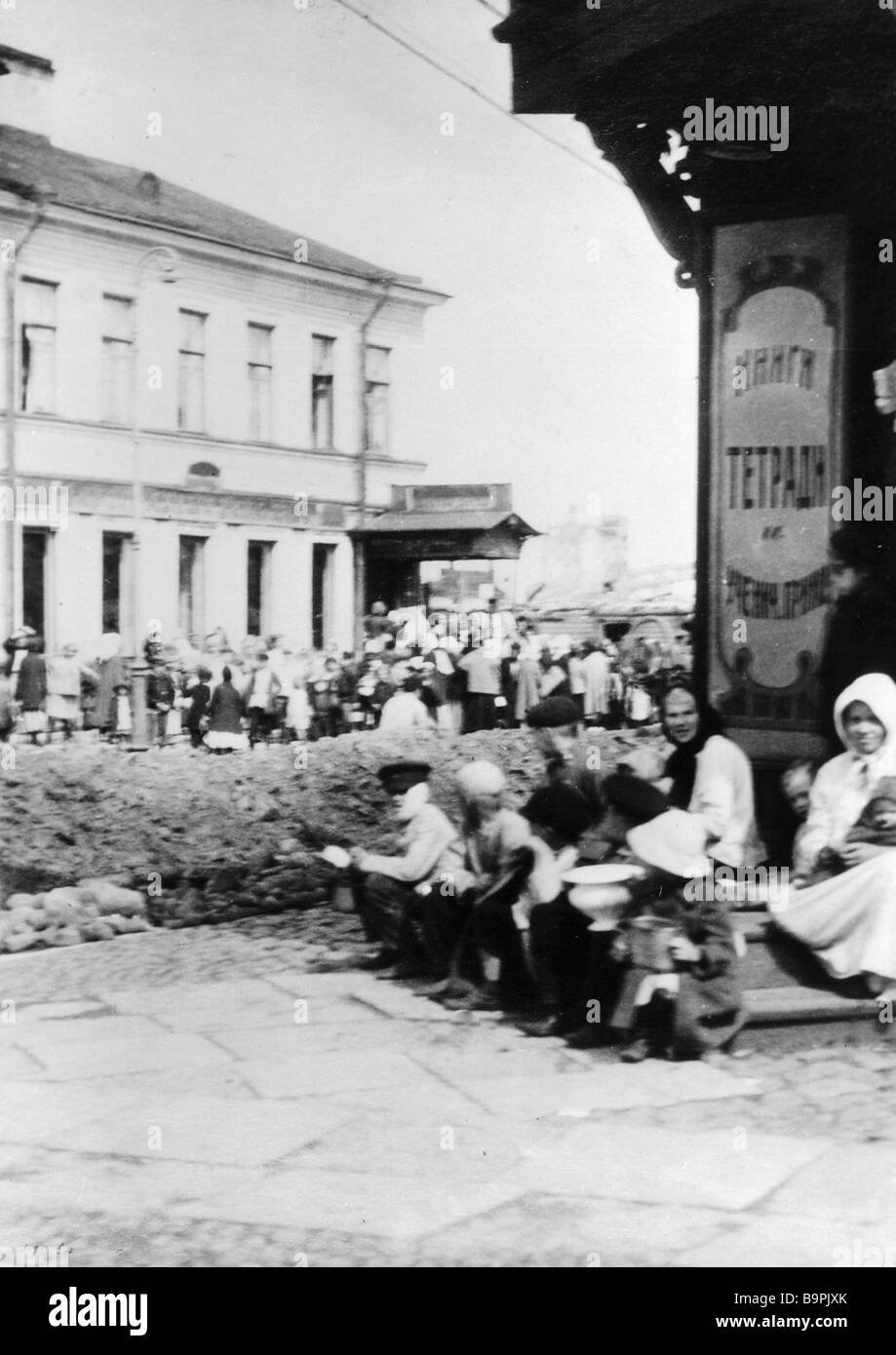 Lining the food store queue during the Russian Civil War Stock Photo ...