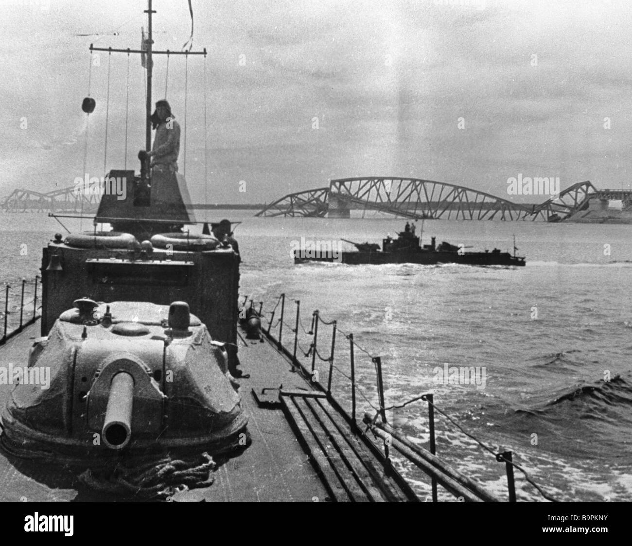 Armored boats of the Danube flotilla near a bridge in Belgrade blown up ...