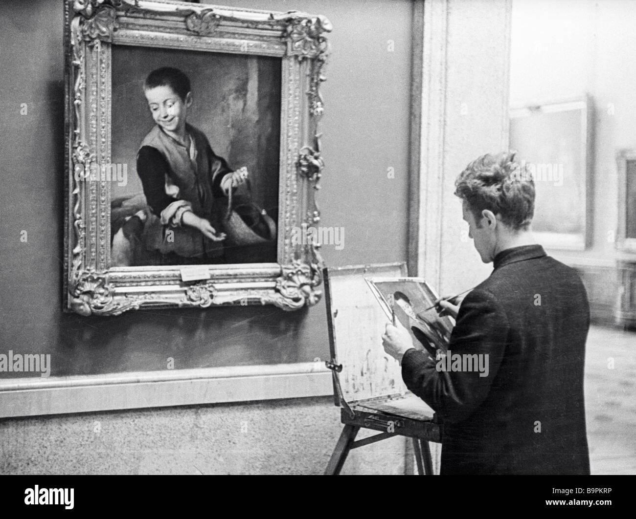 A young artist copying Spanish Bartolome Murillo s painting Boy with a ...