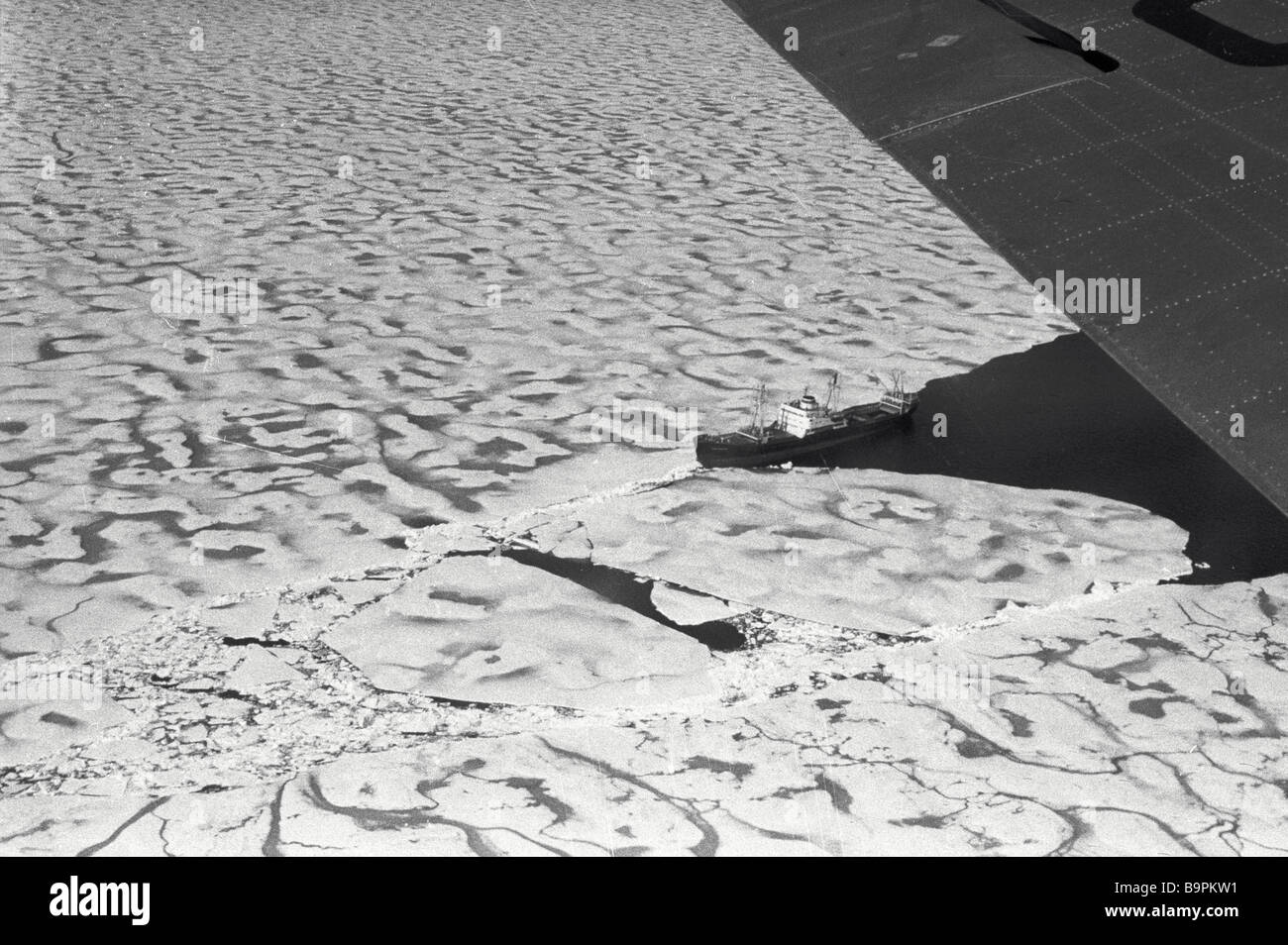 An icebreaker struggling through an ice floe Stock Photo - Alamy