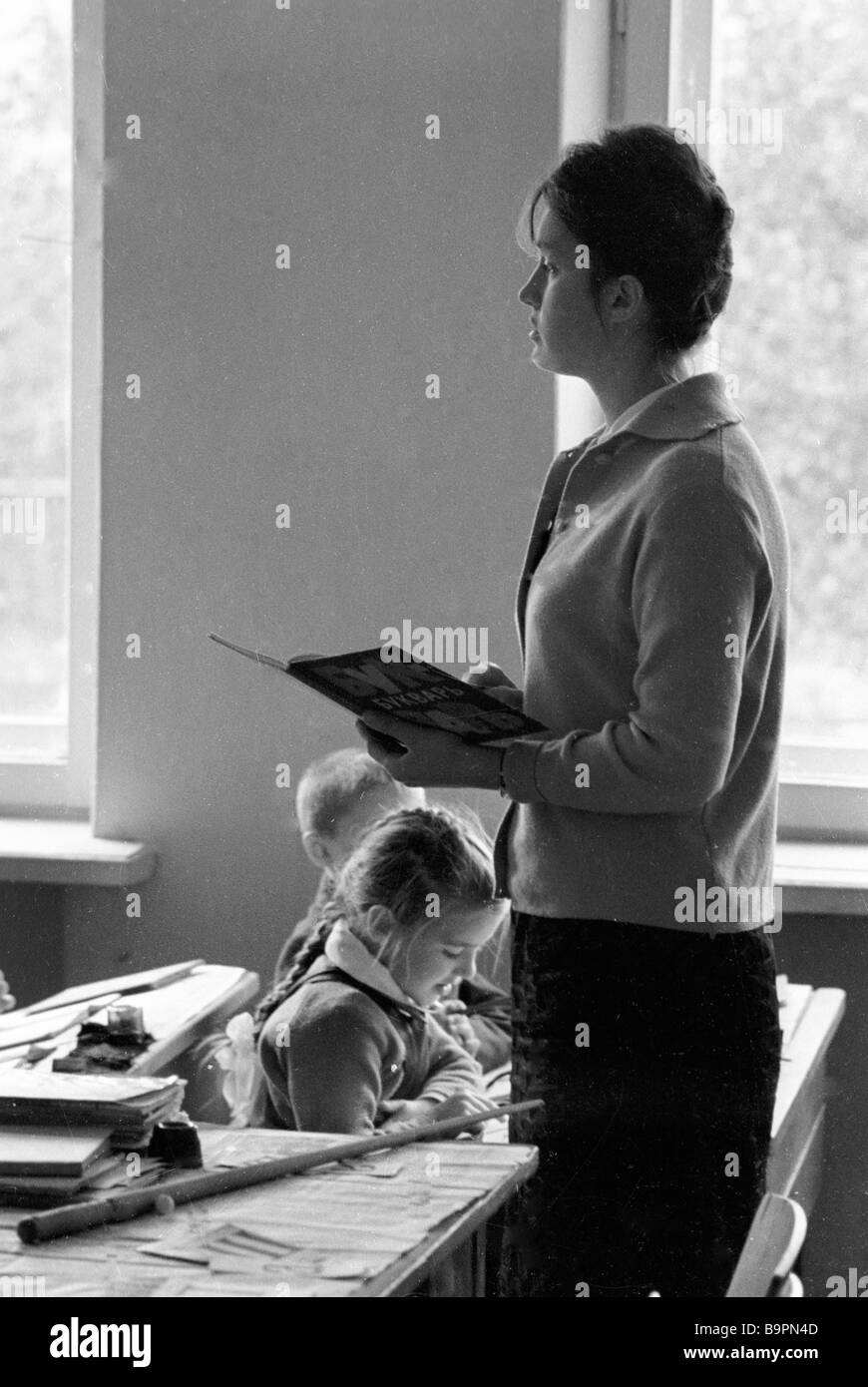 Teaching a lesson Stock Photo - Alamy