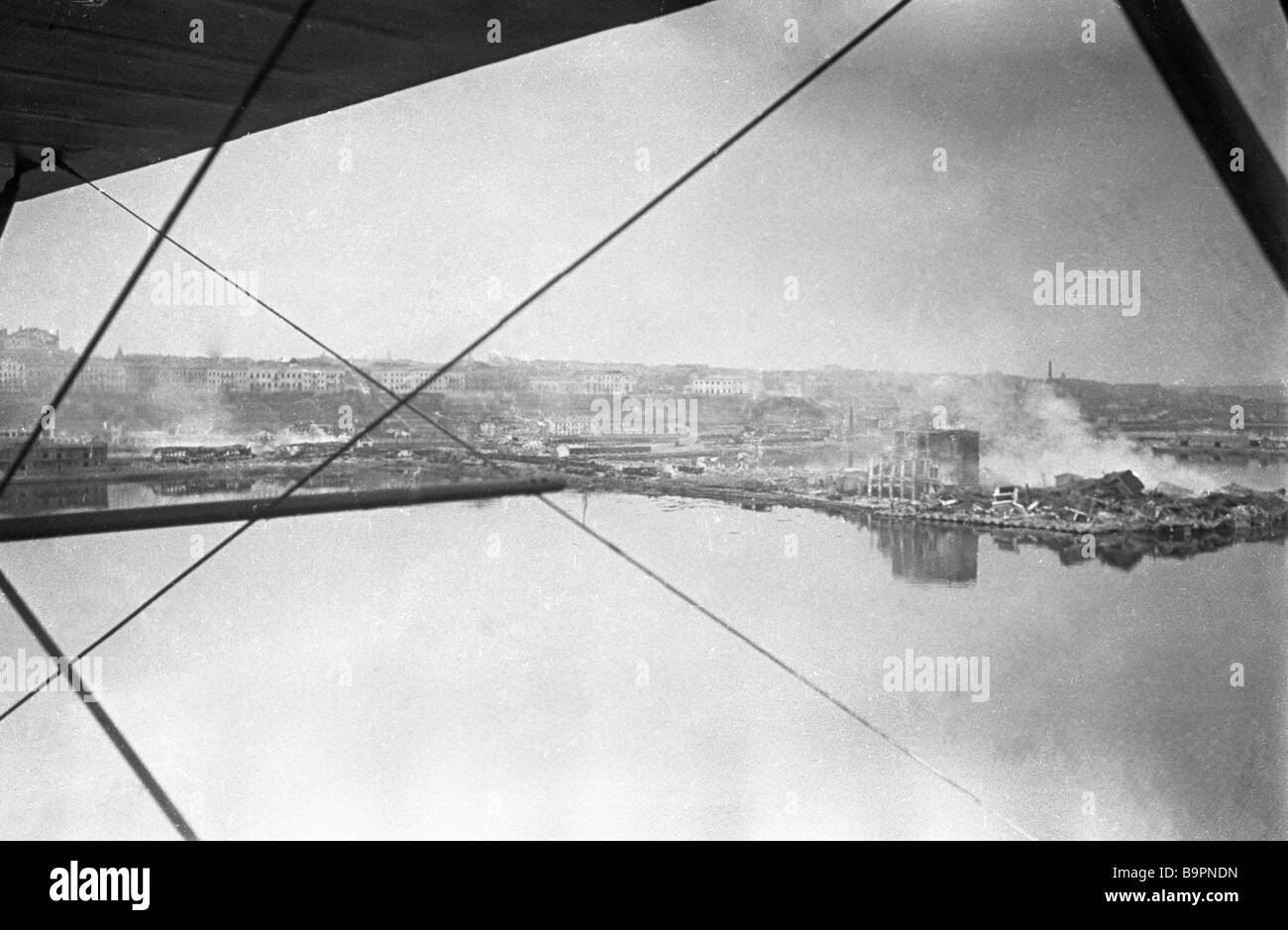 The port set on fire by the Nazis Stock Photo - Alamy