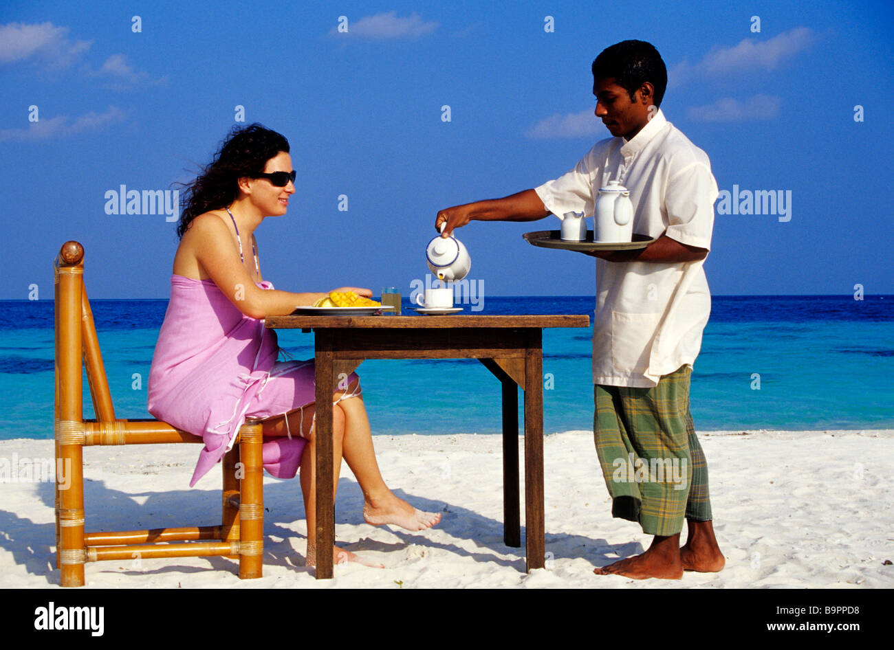 Luxury resort waiter hi-res stock photography and images - Alamy
