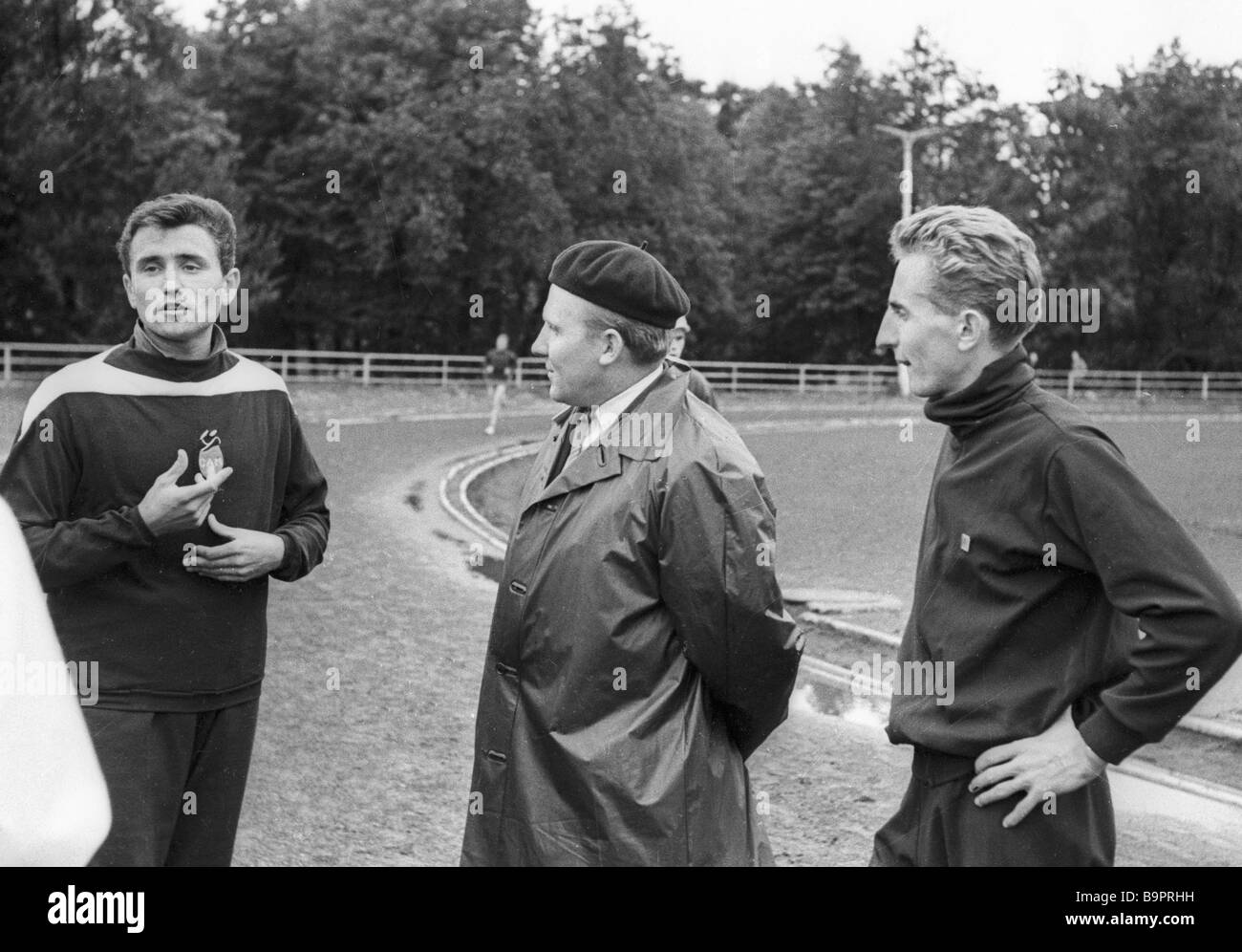 French athletes Michel Jazy left and Robert Bojay right being trained ...