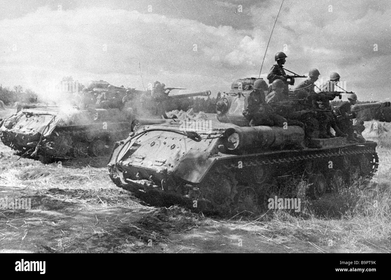 A Soviet tank and infantry attack Stock Photo - Alamy