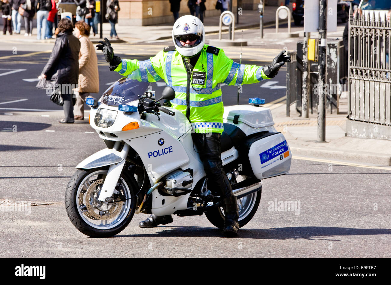Police motorbike stops traffic Stock Photo - Alamy