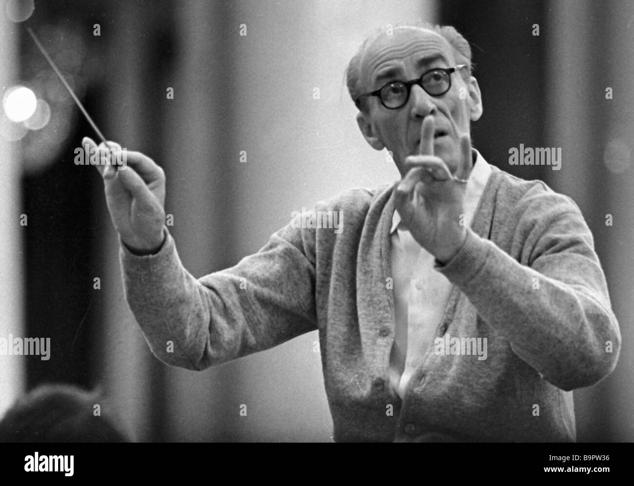 Yevgeny Mravinsky conducting an orchestra Stock Photo - Alamy