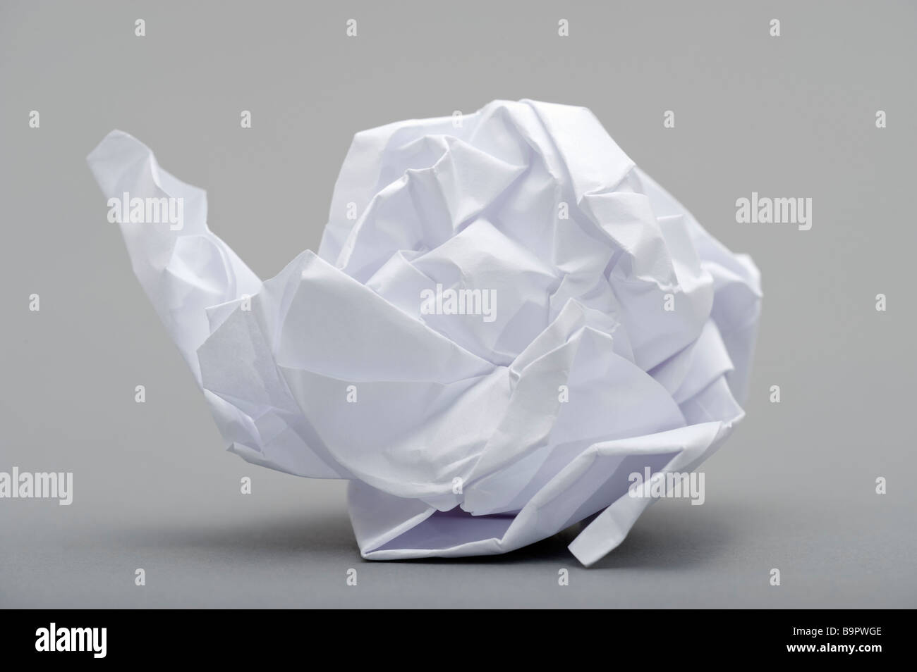 Crumpled piece of white paper Stock Photo - Alamy