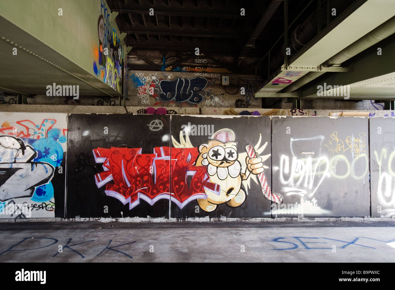Graffiti on underside of bridge Stock Photo - Alamy