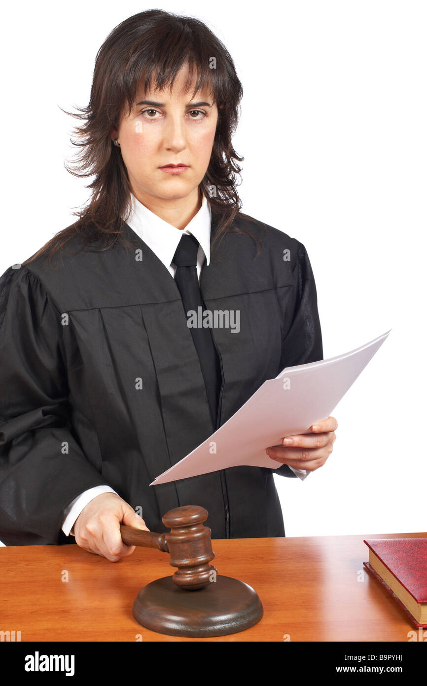 A female judge in a courtroom reading the verdict and striking the ...
