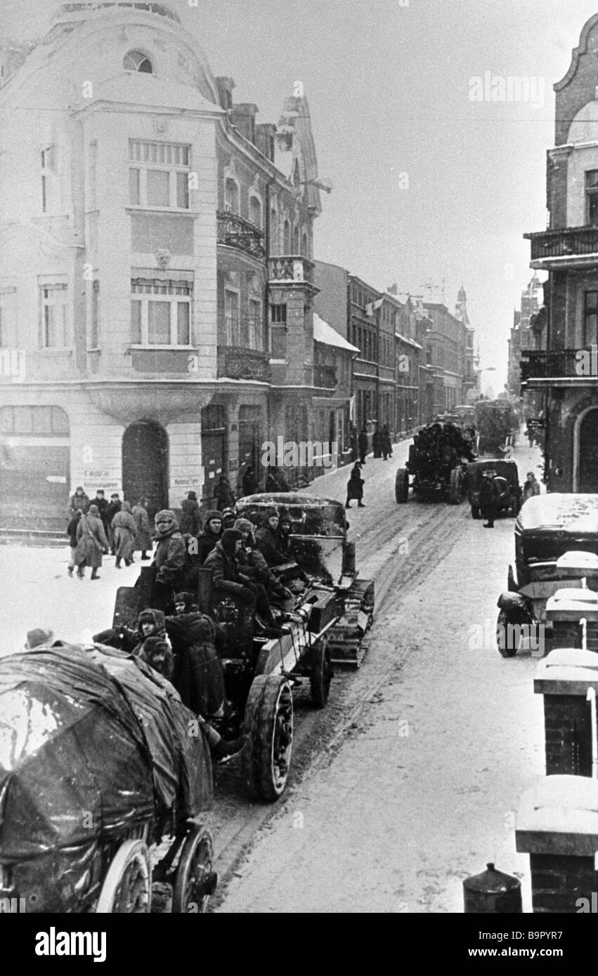 Soviet troops marching along the streets of a German town Stock Photo ...