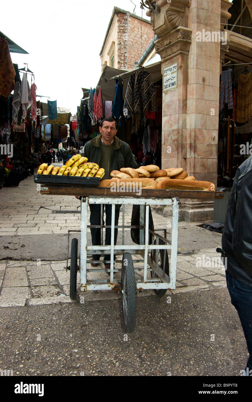 Bread seller with food cart in Arab market of old Jerusalem city Stock ...