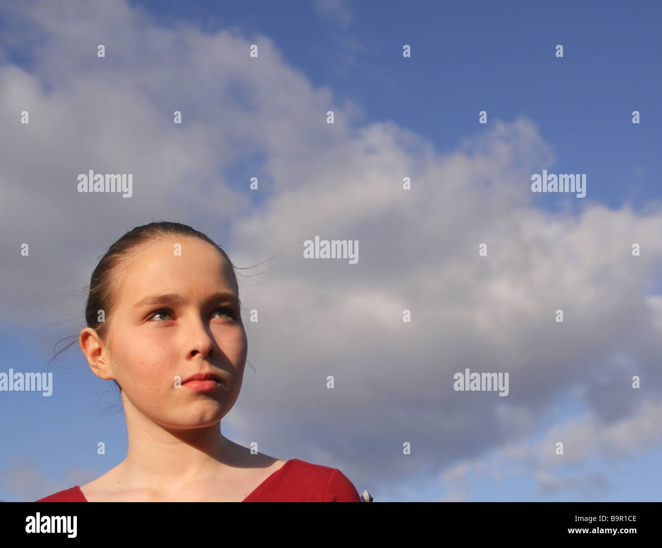 Young girl with smug grin Stock Photo - Alamy