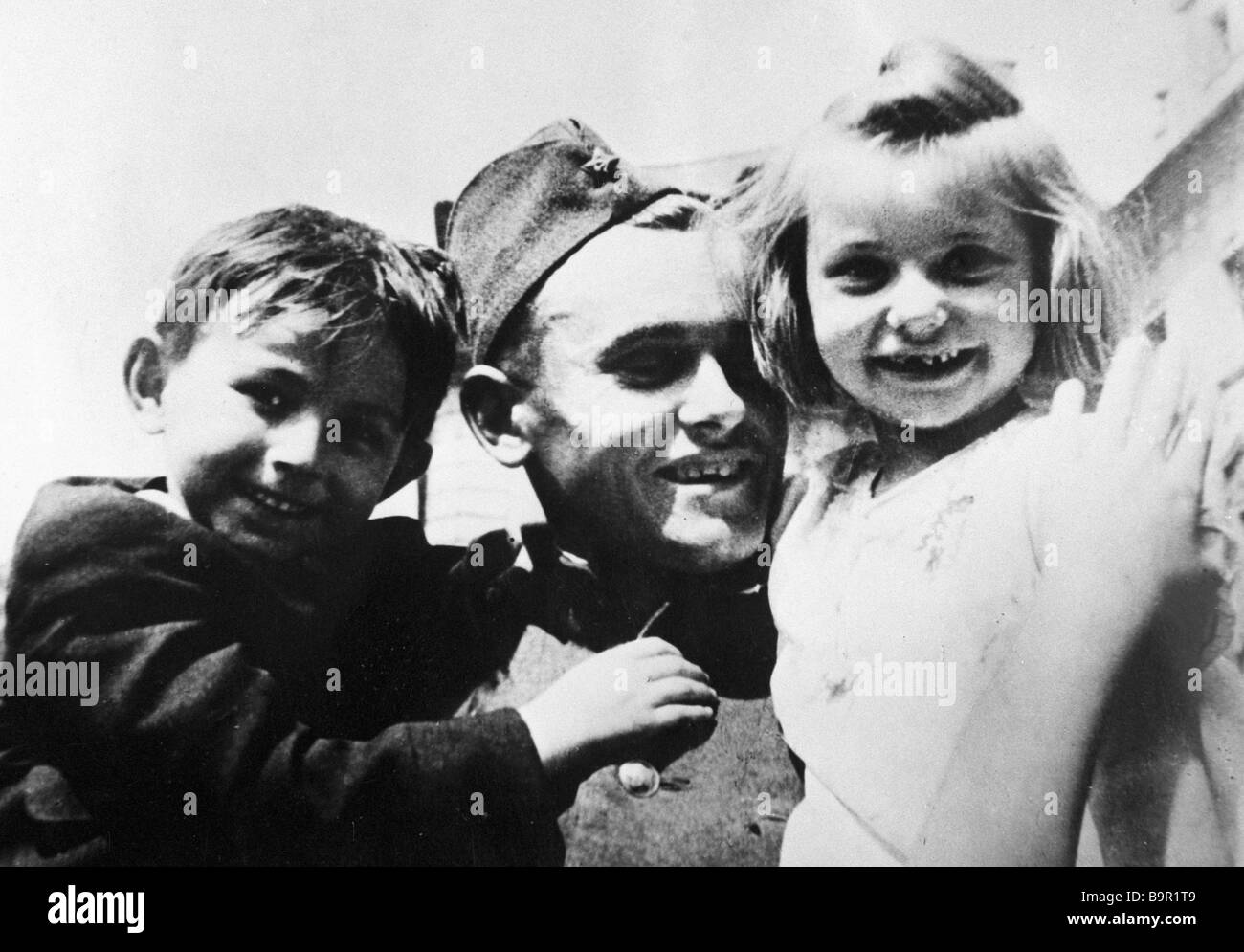 A Soviet soldier liberator with Czech children Stock Photo - Alamy