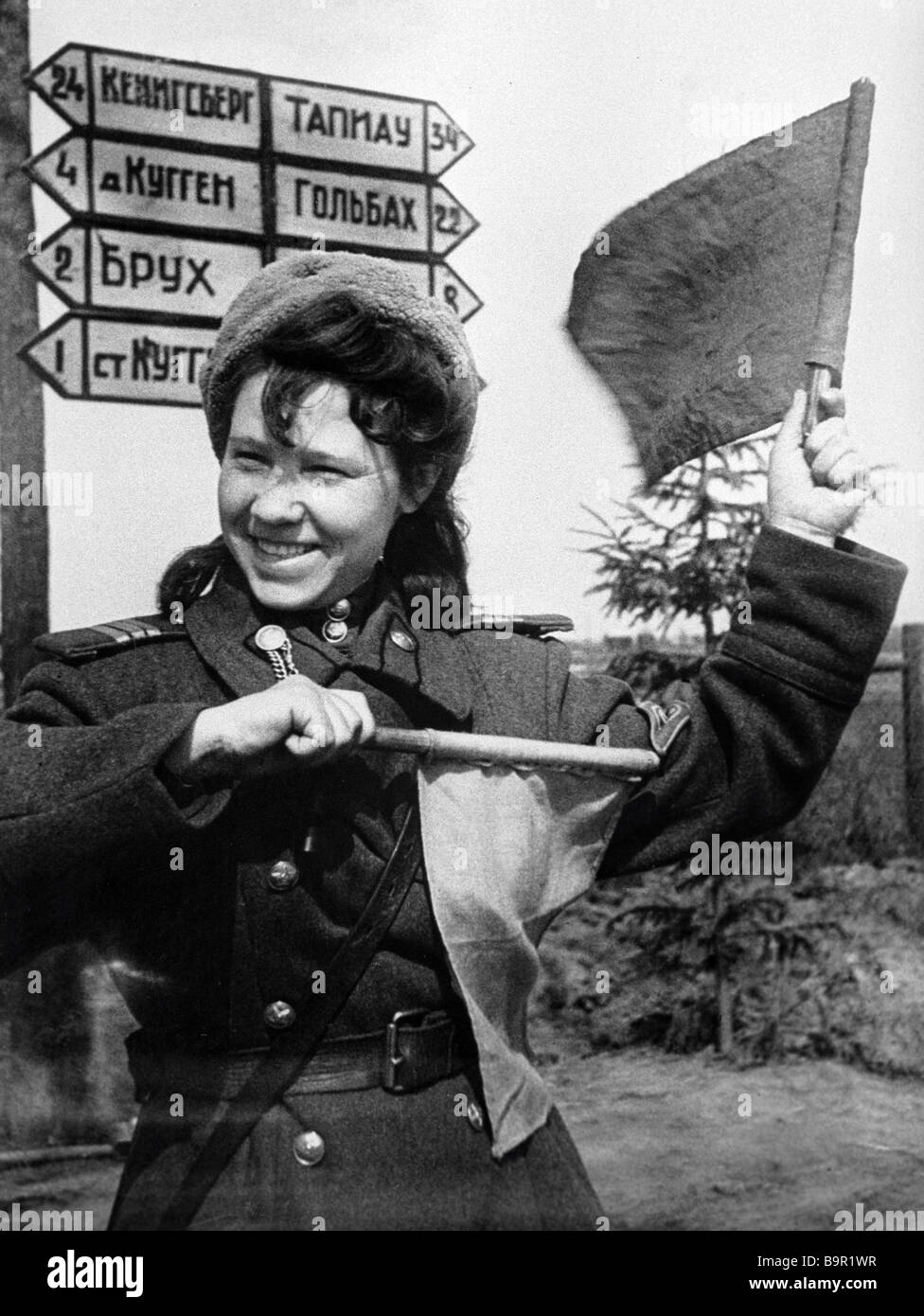 A Soviet female traffic controller in one of the German streets in 1945 ...
