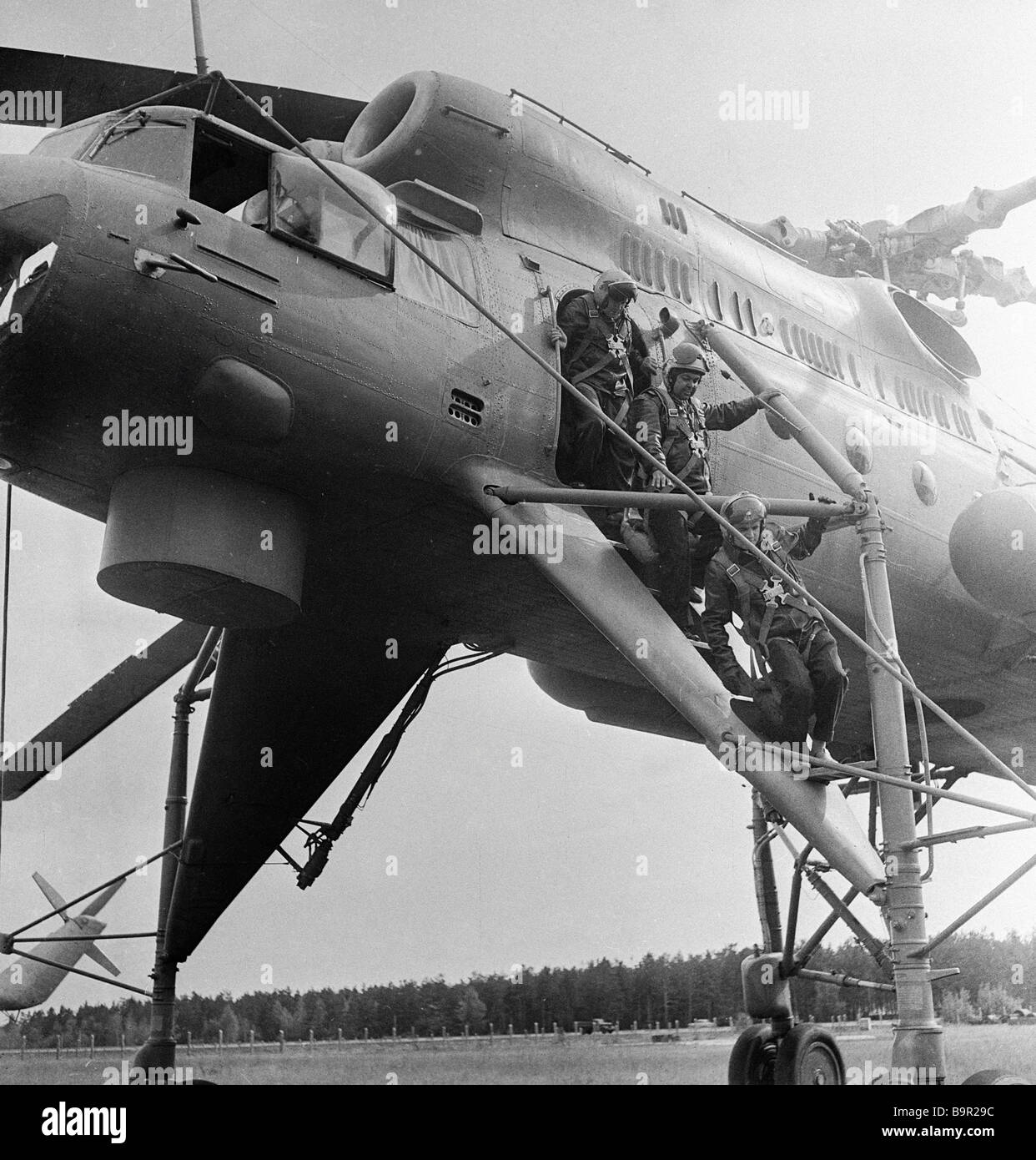 Test pilots getting off a V 1 helicopter Stock Photo - Alamy
