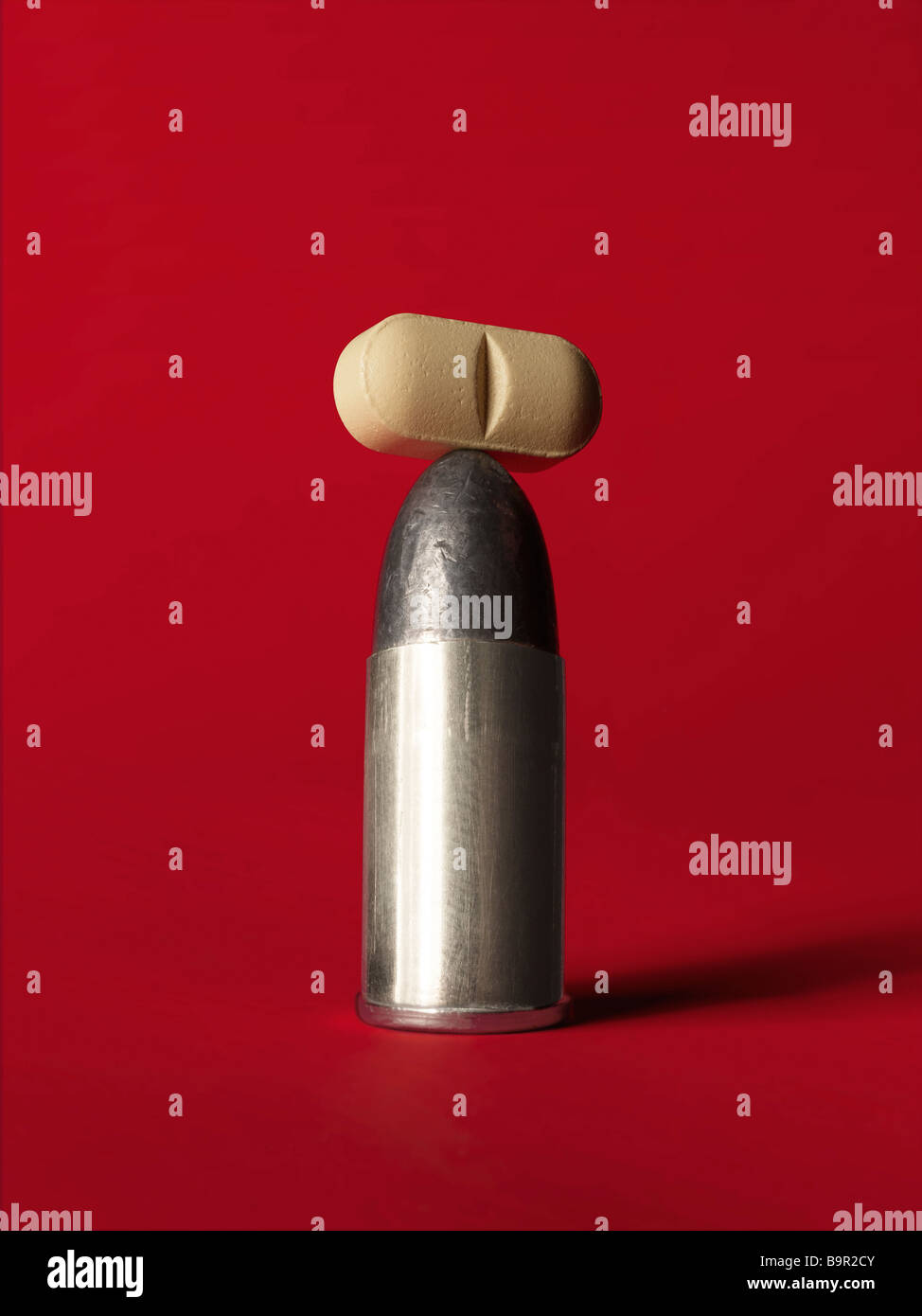 Pill on Tip of Bullet Stock Photo - Alamy