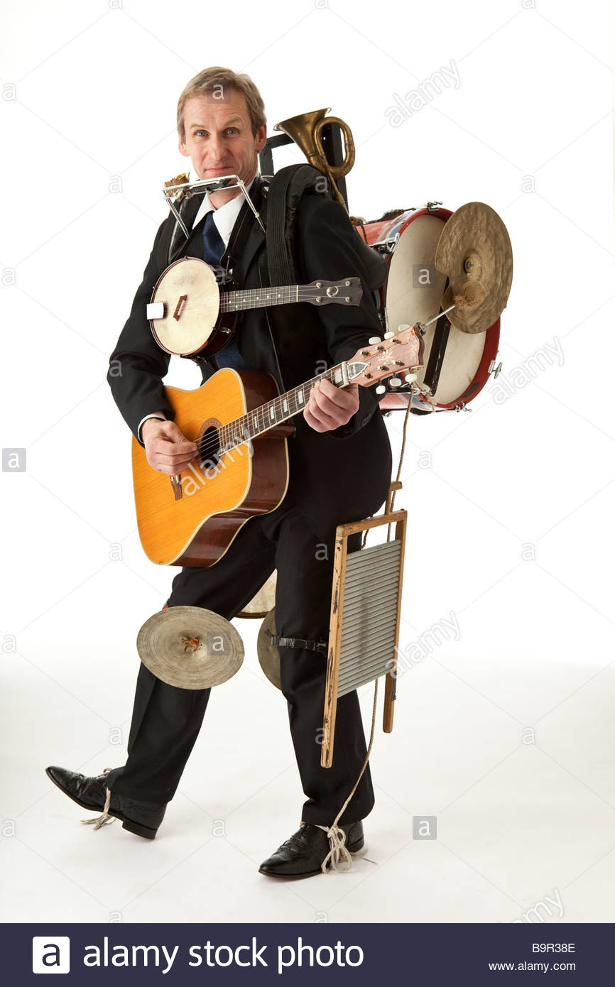 Businessman dressed as a one man band Stock Photo: 23249758 - Alamy